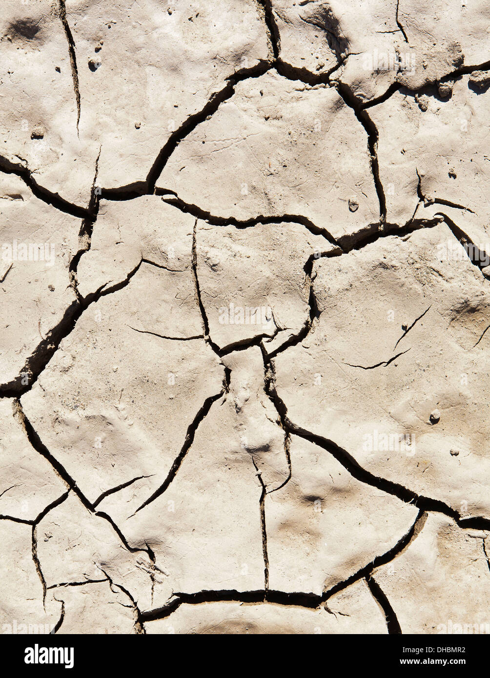 Cracked parched earth and baked mud on the ground. Drought Stock Photo ...