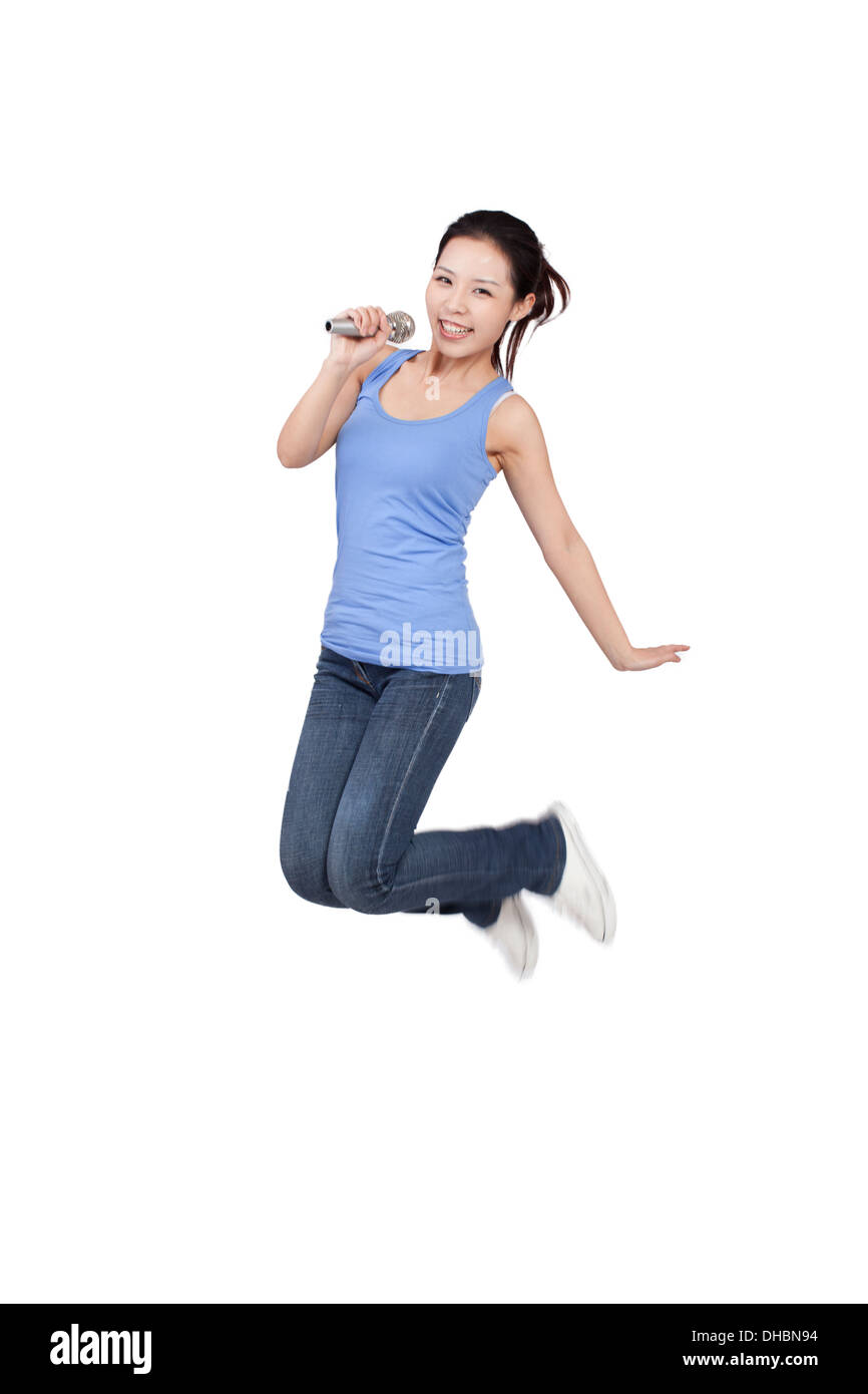 Standing singing microphone arms up mouth open hi-res stock photography ...