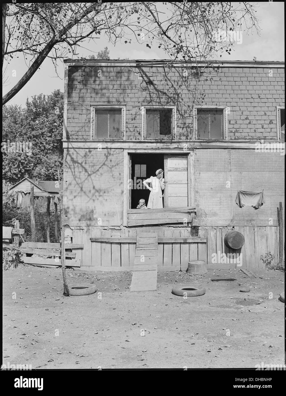 A former store building, now repurposed as living quarters, houses ...