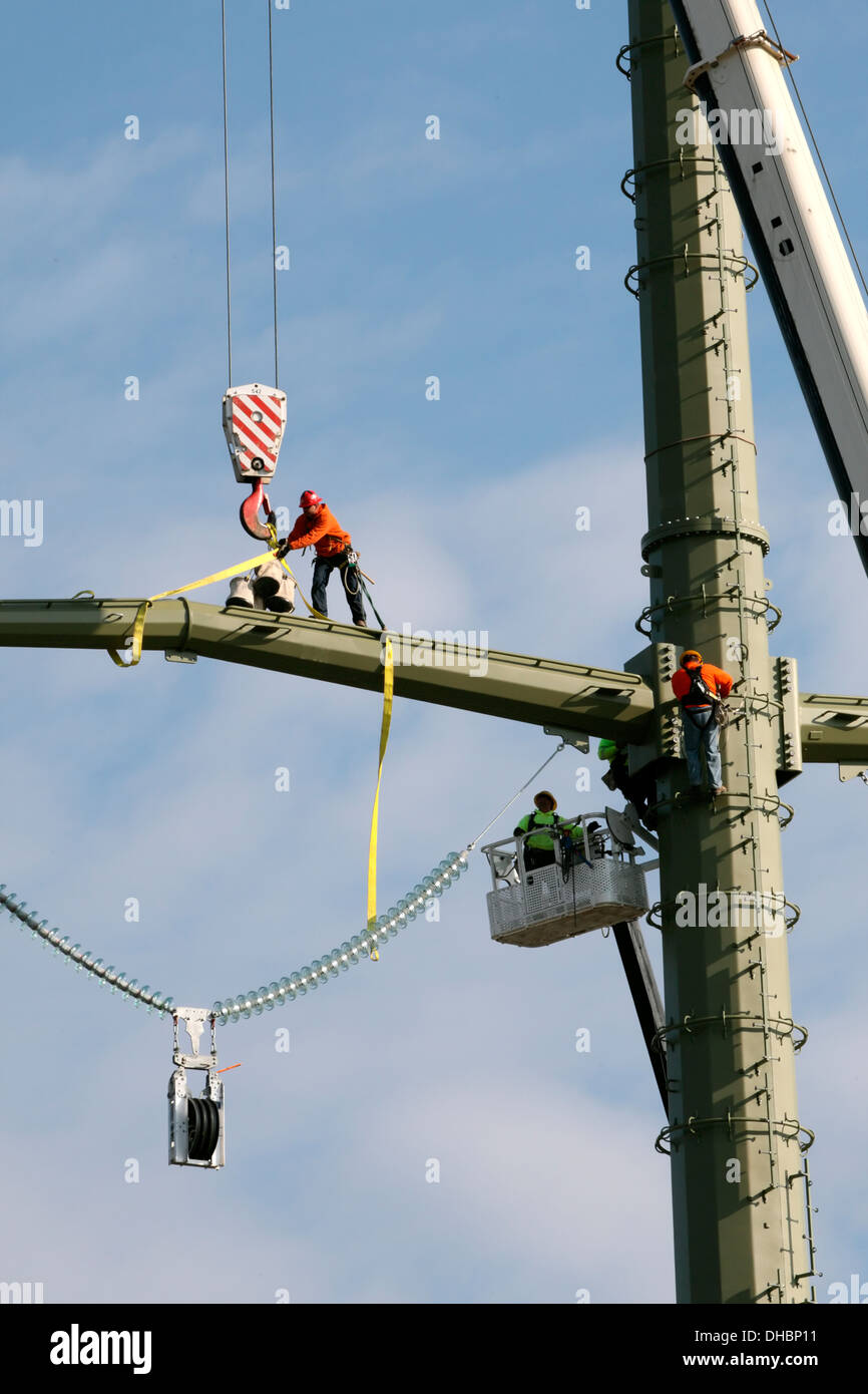 Construction of a power transmission tower Stock Photo - Alamy