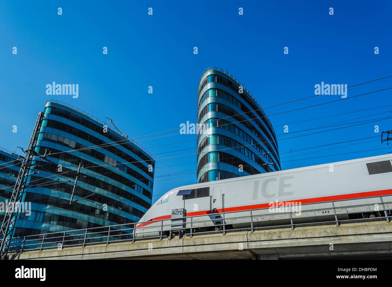 Modern high speed train with modern office buildings in Berlin, Germany Stock Photo - Alamy