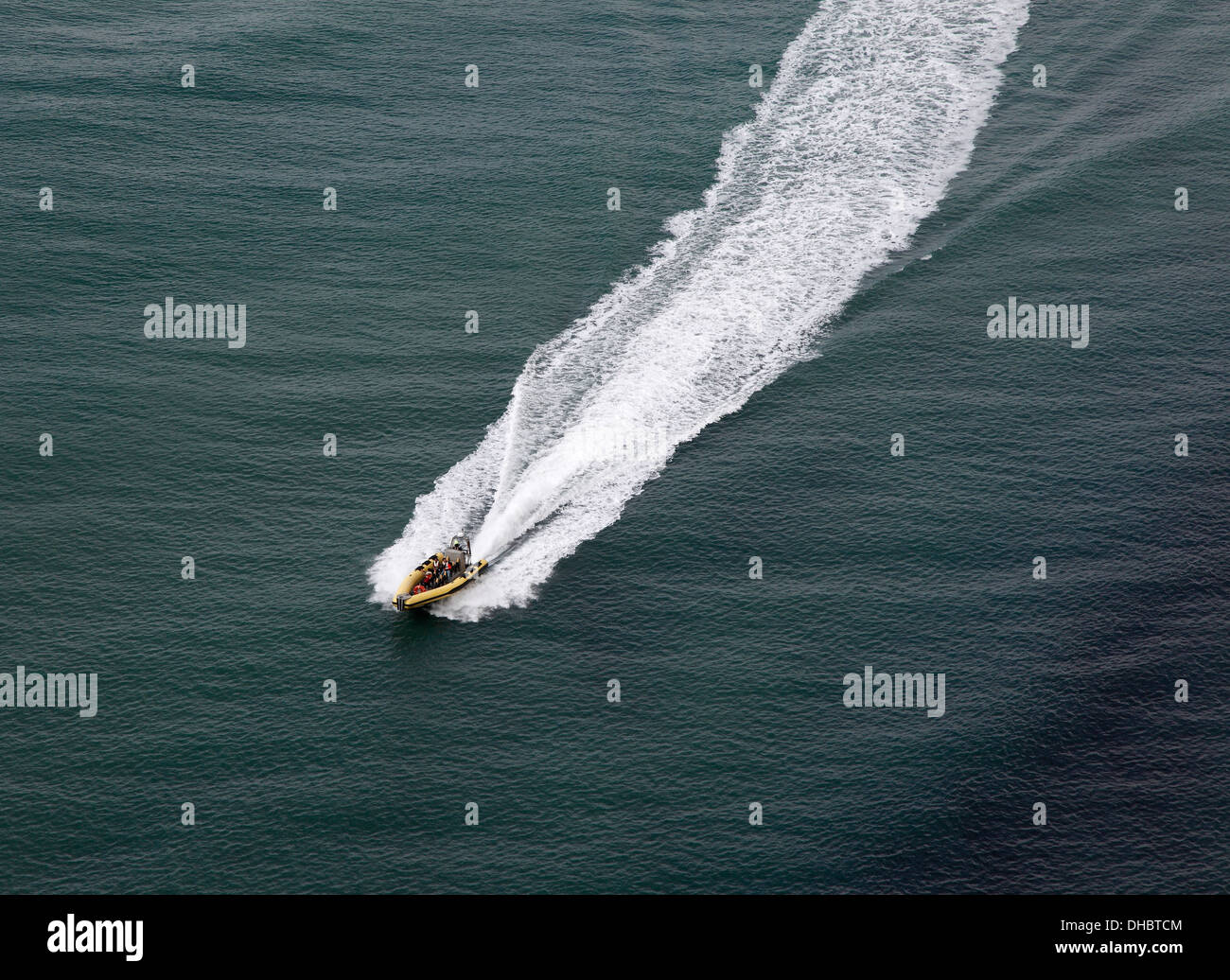 Fast rigid inflatable boat on sightseeing trip near the Needles Isle of ...