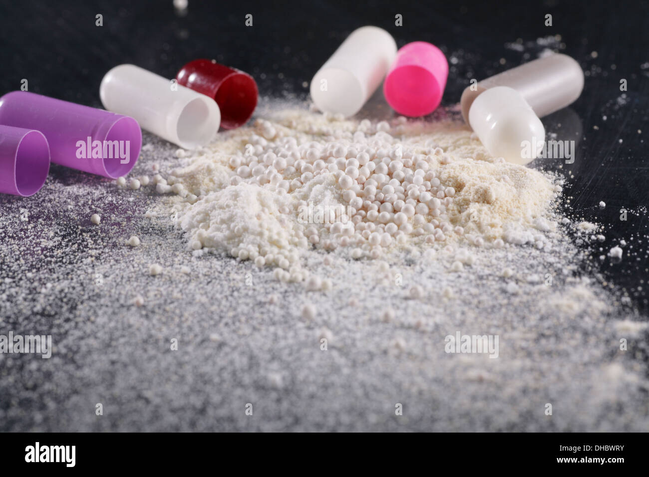 Macro shot of powder by open pills Stock Photo - Alamy