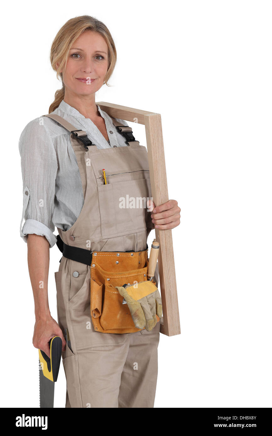 Female construction worker holding hammer hi-res stock photography and ...