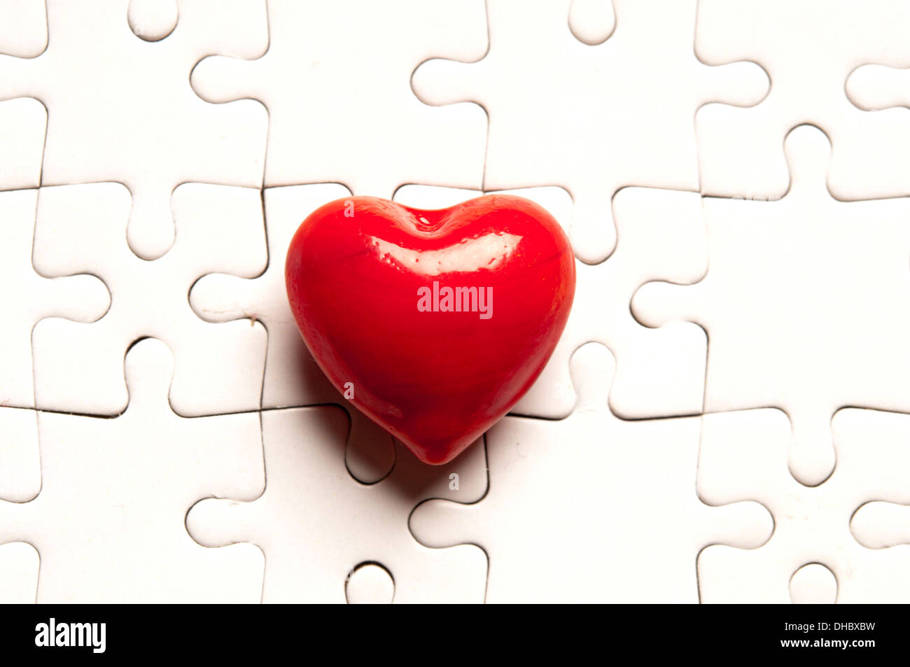 heart shape on jigsaw puzzle, love concept Stock Photo - Alamy