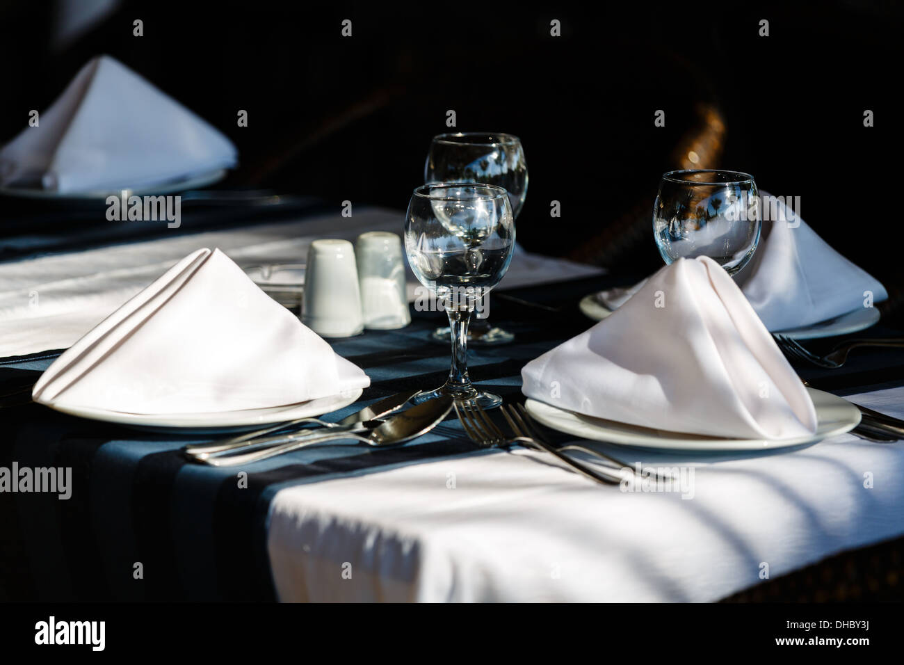 Table at restaurant served for reception of visitors Stock Photo - Alamy
