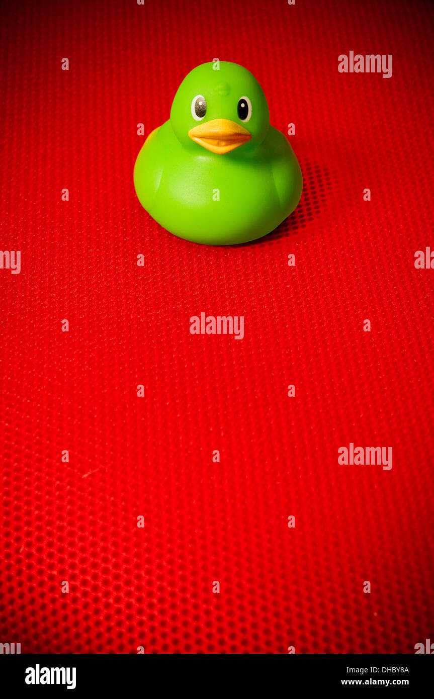 green plastic toy duck Stock Photo - Alamy