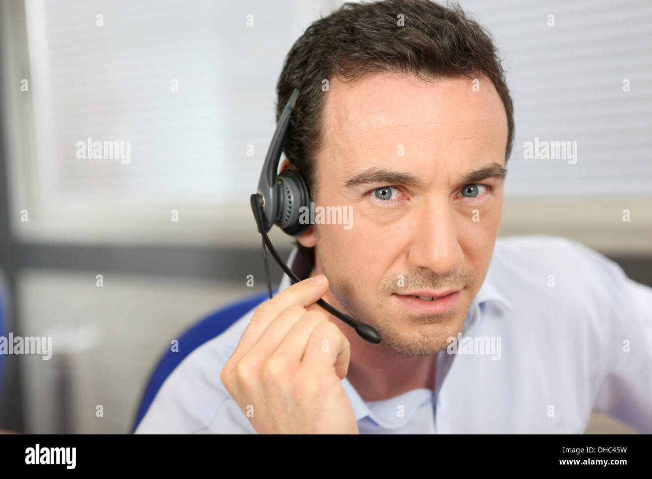 Man wearing a headset Stock Photo - Alamy
