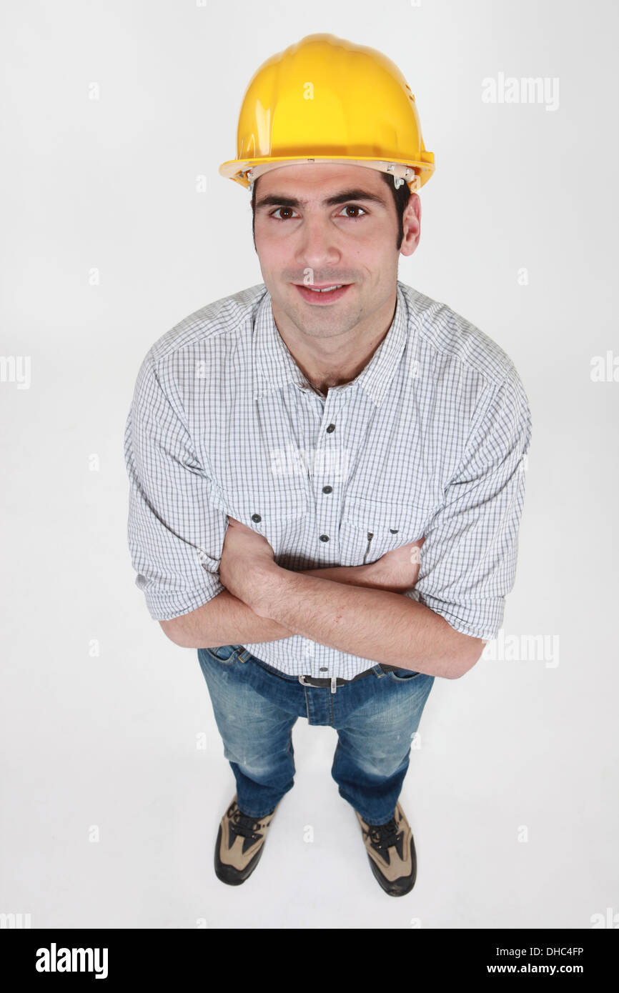 high angle shot of foreman standing cross-armed Stock Photo - Alamy
