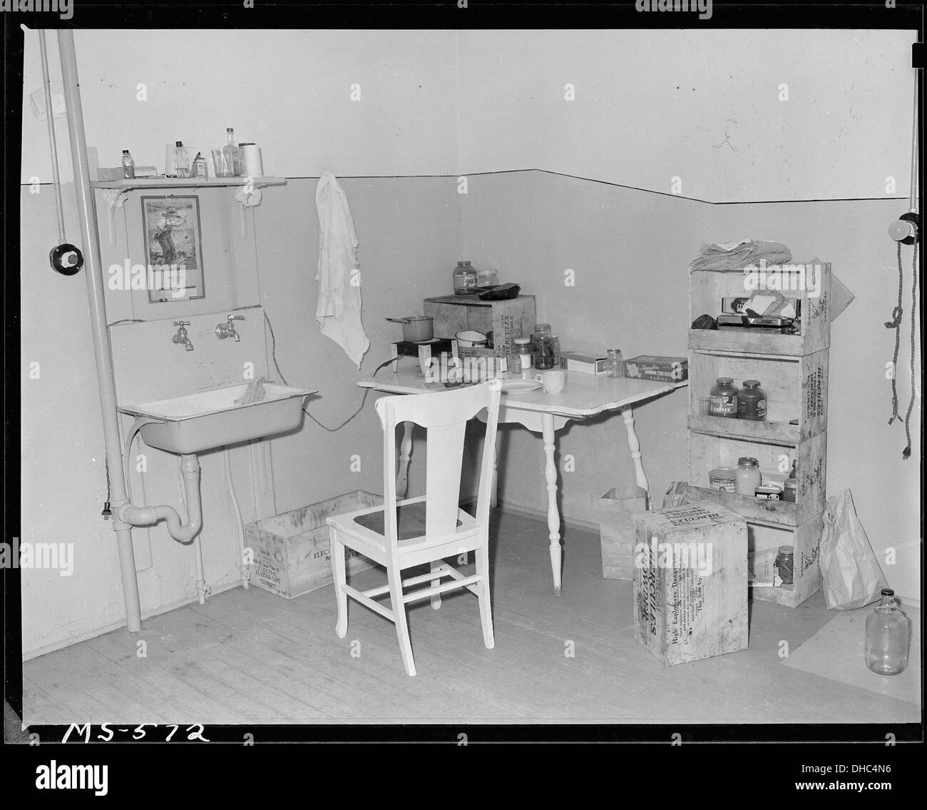 A kitchen in the home of a miner living in a company housing project ...