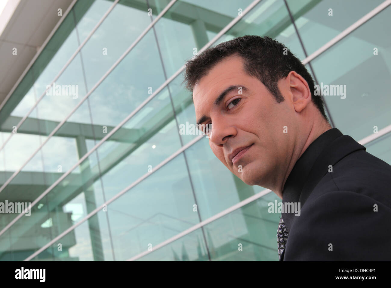 Executive portrait in front of building Stock Photo - Alamy