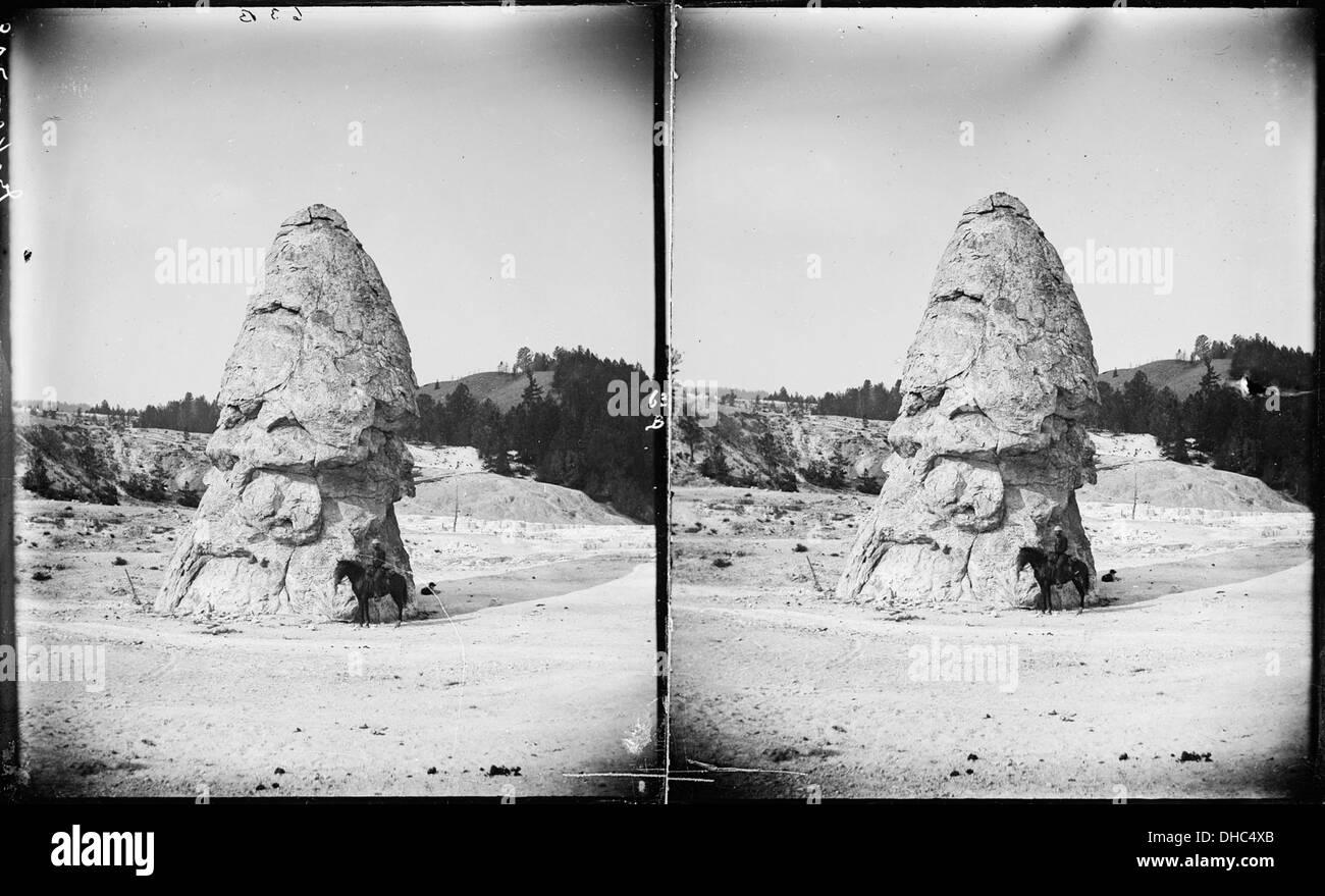 Liberty Cap, a prominent geothermal feature in Yellowstone National ...