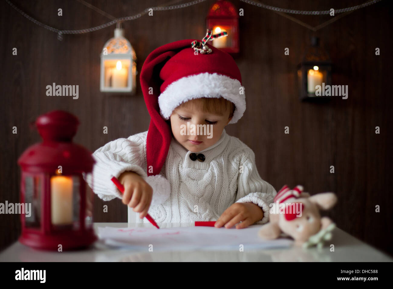 Boy, writing letter to Santa Stock Photo - Alamy