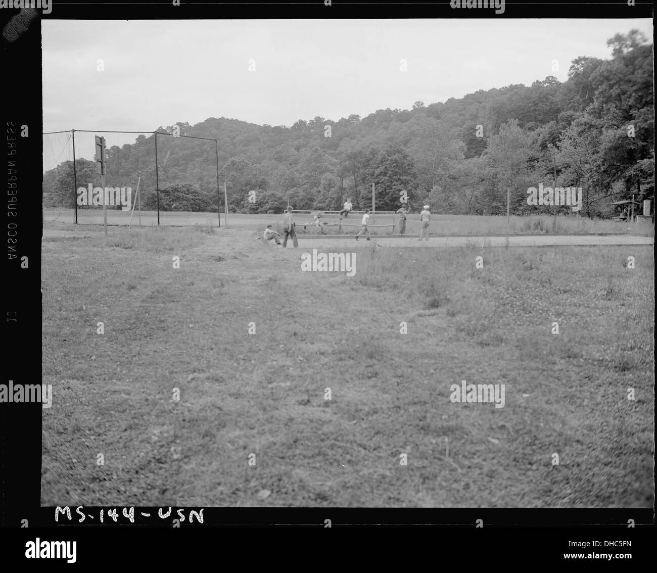 Children play in playground Black and White Stock Photos & Images - Alamy