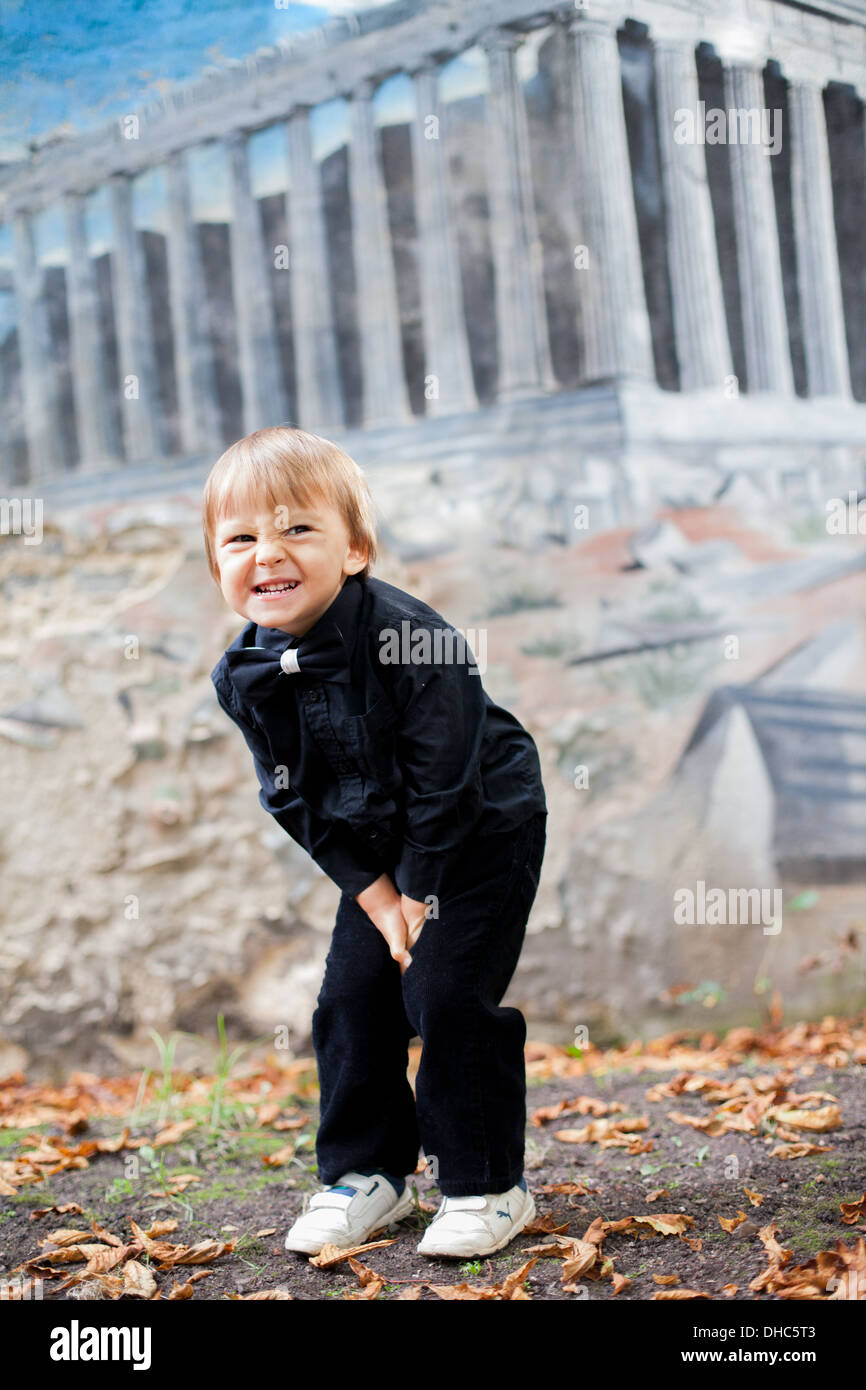 Boy with a bow, posing Stock Photo - Alamy