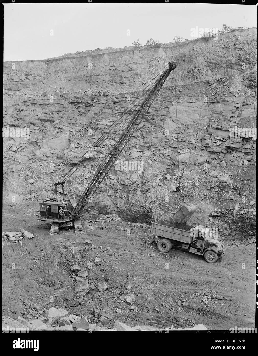 A large steam shovel is used in a stripping operation at a coal mine ...