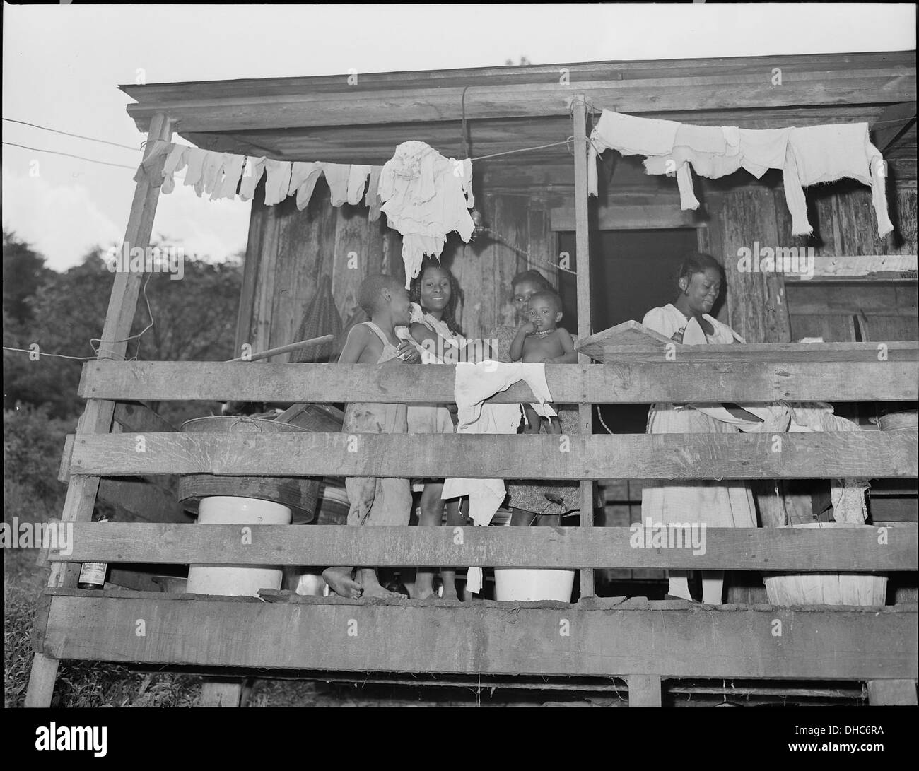 Mrs. Lawson Mayo and some of her ten children on the front porch of ...