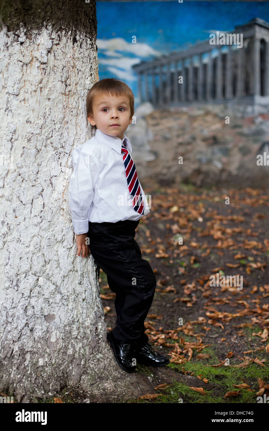 Boy with a tie, posing Stock Photo - Alamy