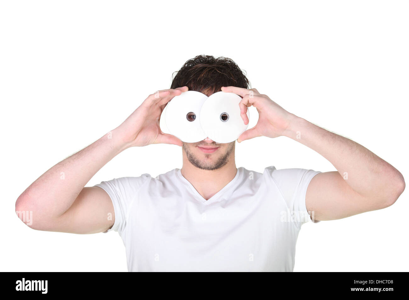 young man hiding his face behind a mask Stock Photo - Alamy