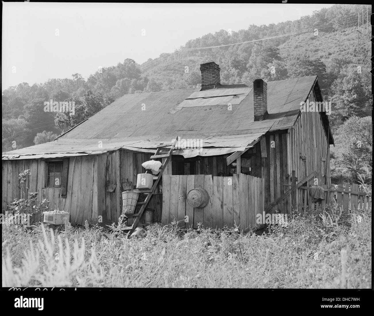 Oliver Hinkle's house for which he pays $9 monthly. His wife built the ...