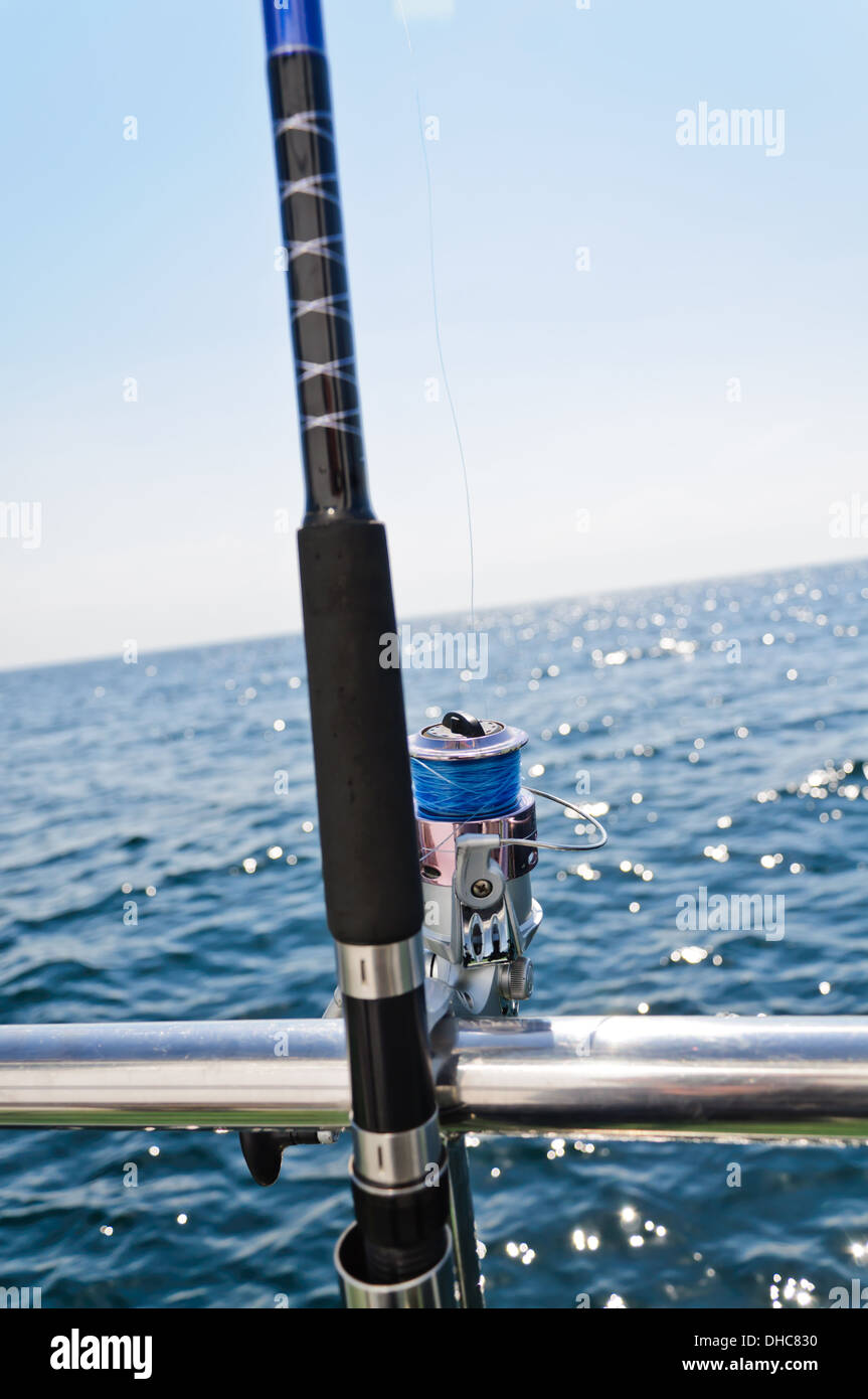 fishing rod on the boat Stock Photo - Alamy