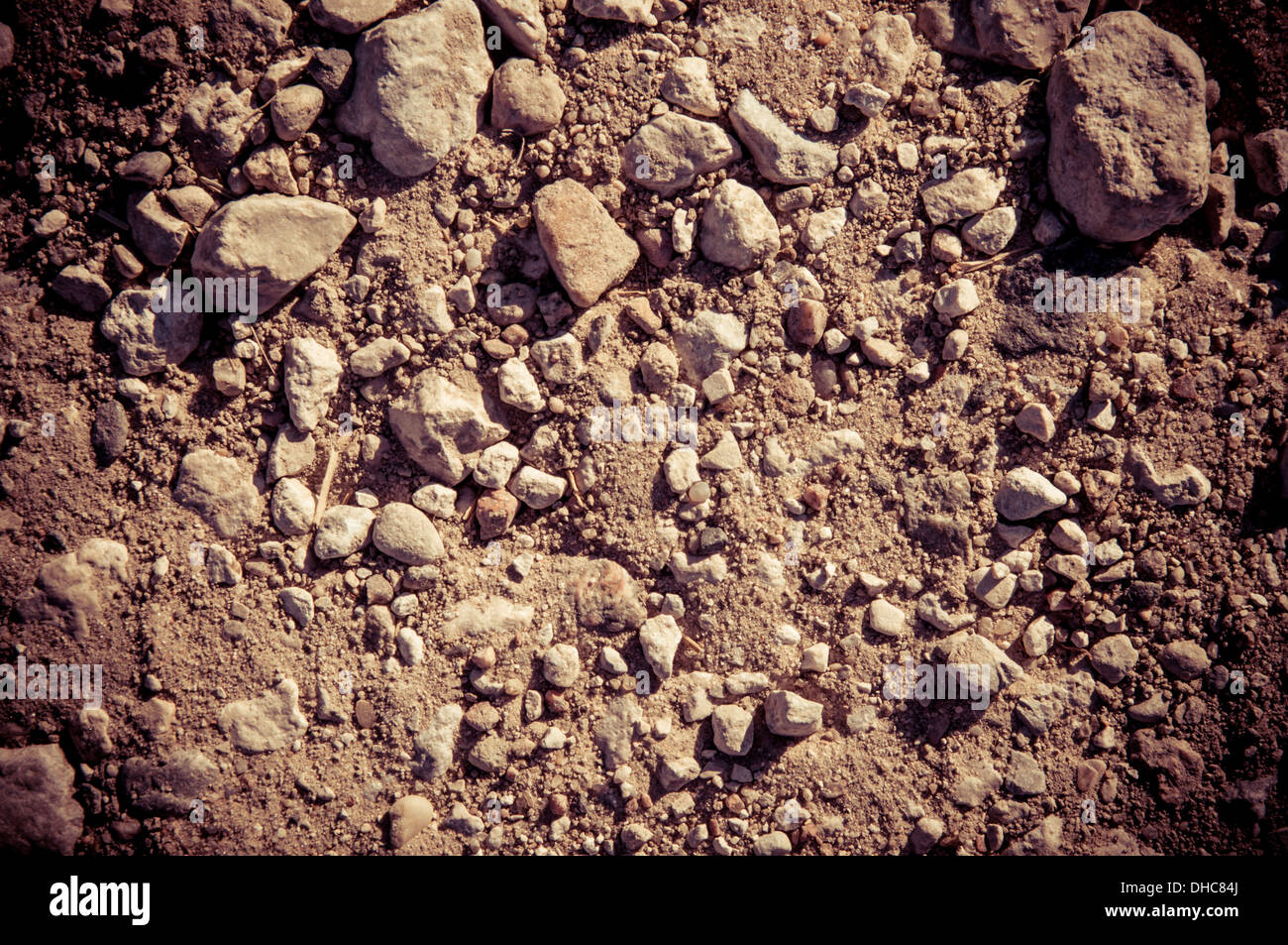 Dry soil and stones of an agricultural field Stock Photo - Alamy