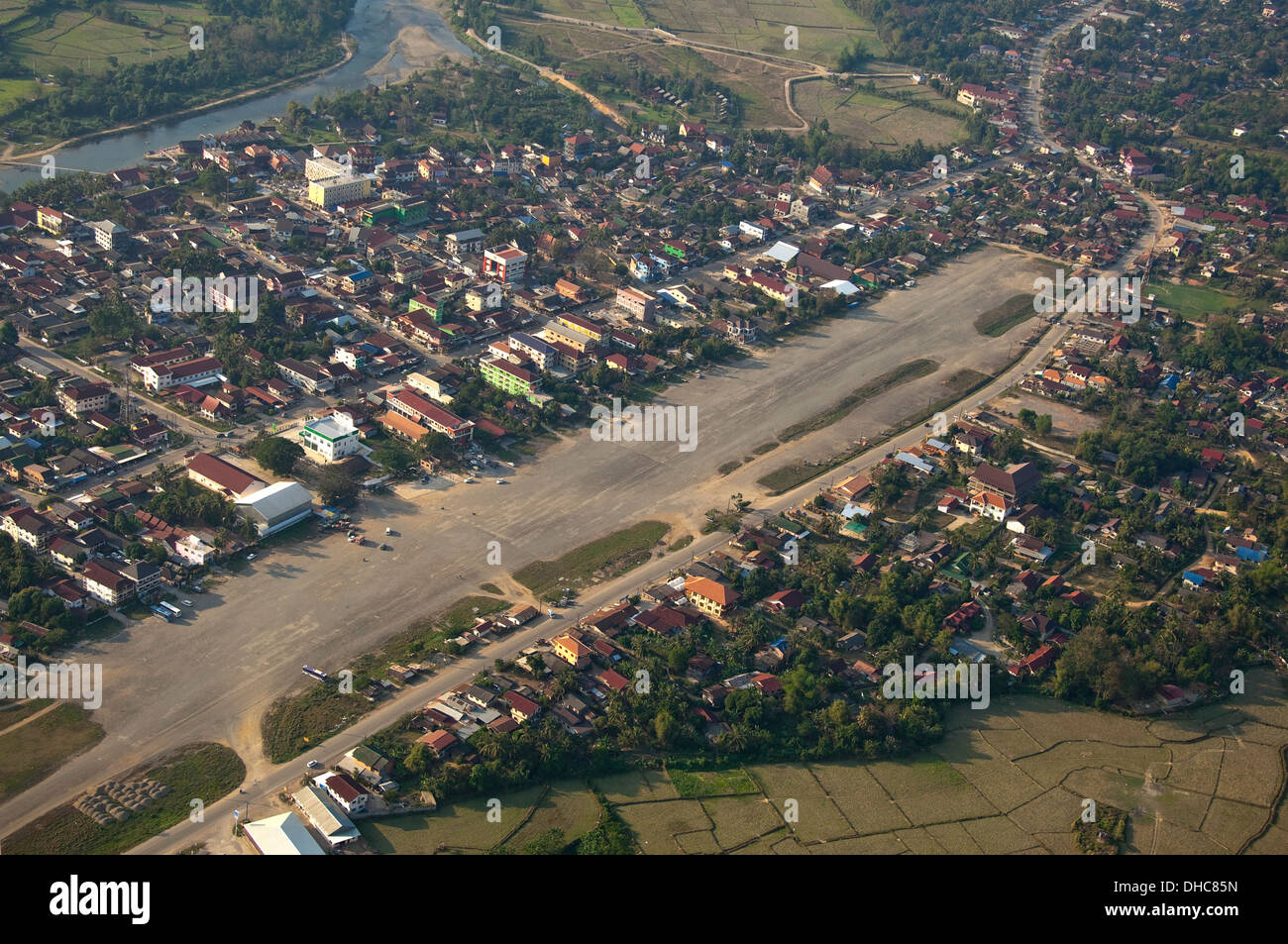 Horizontal aerial view of Vang Vieng and the disused American runway ...