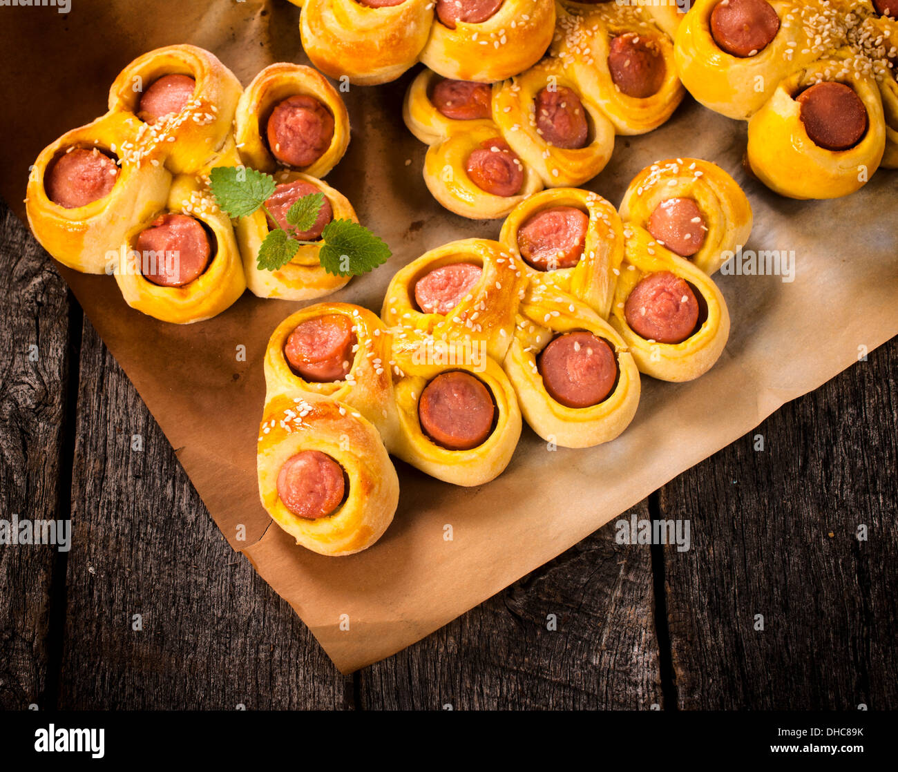 Grilled mini hot dogs in the fresh baked pastry Stock Photo - Alamy