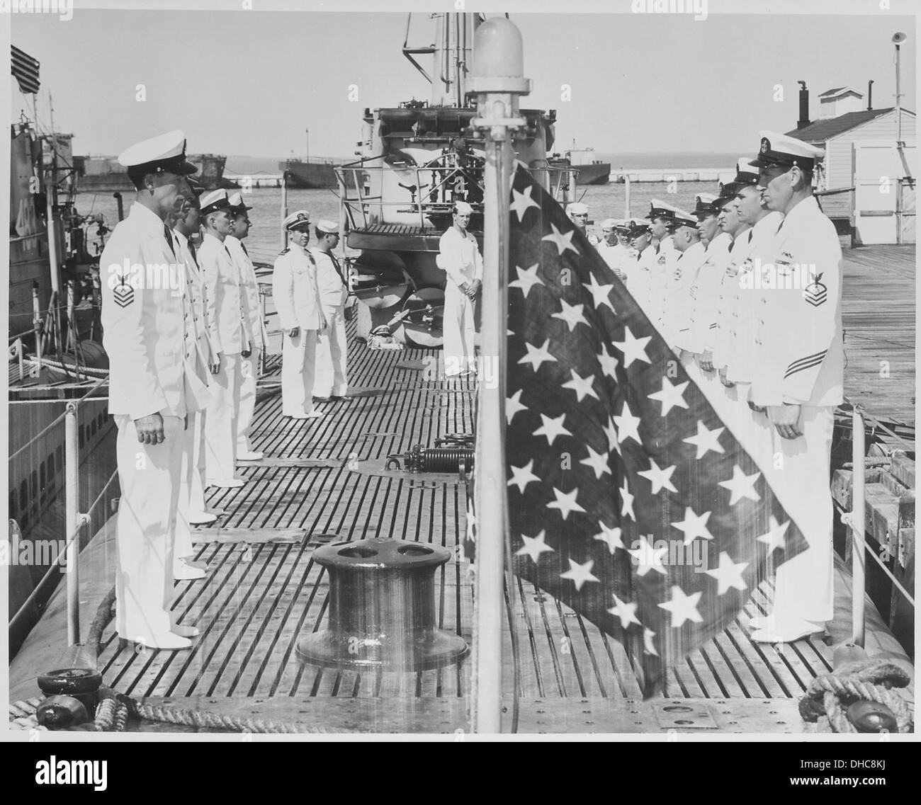 Photograph of crew members aboard the U.S.S. REQUIN, a submarine at the ...