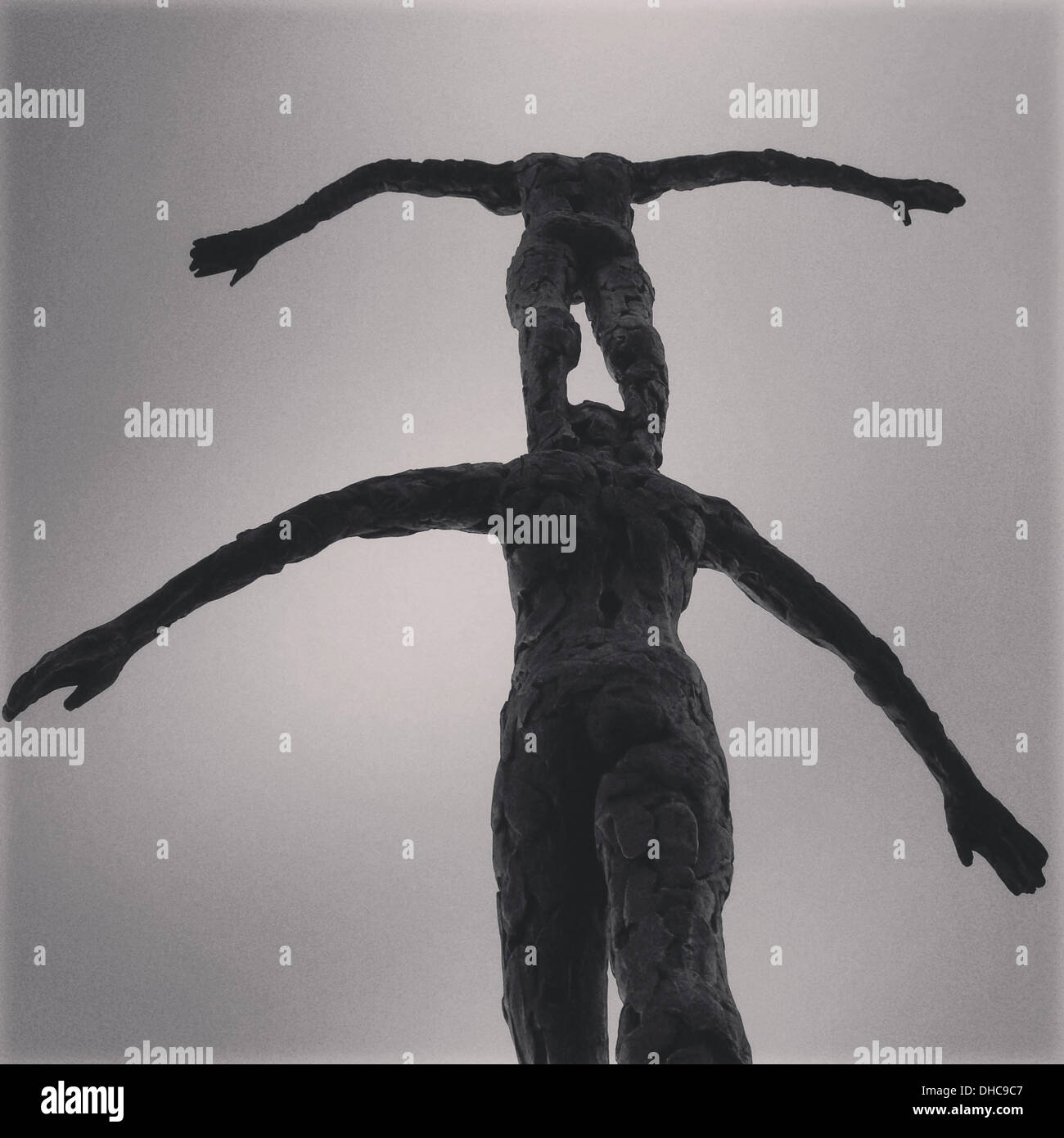 Statue of One Person Standing on Another Person's Shoulders, Low Angle ...