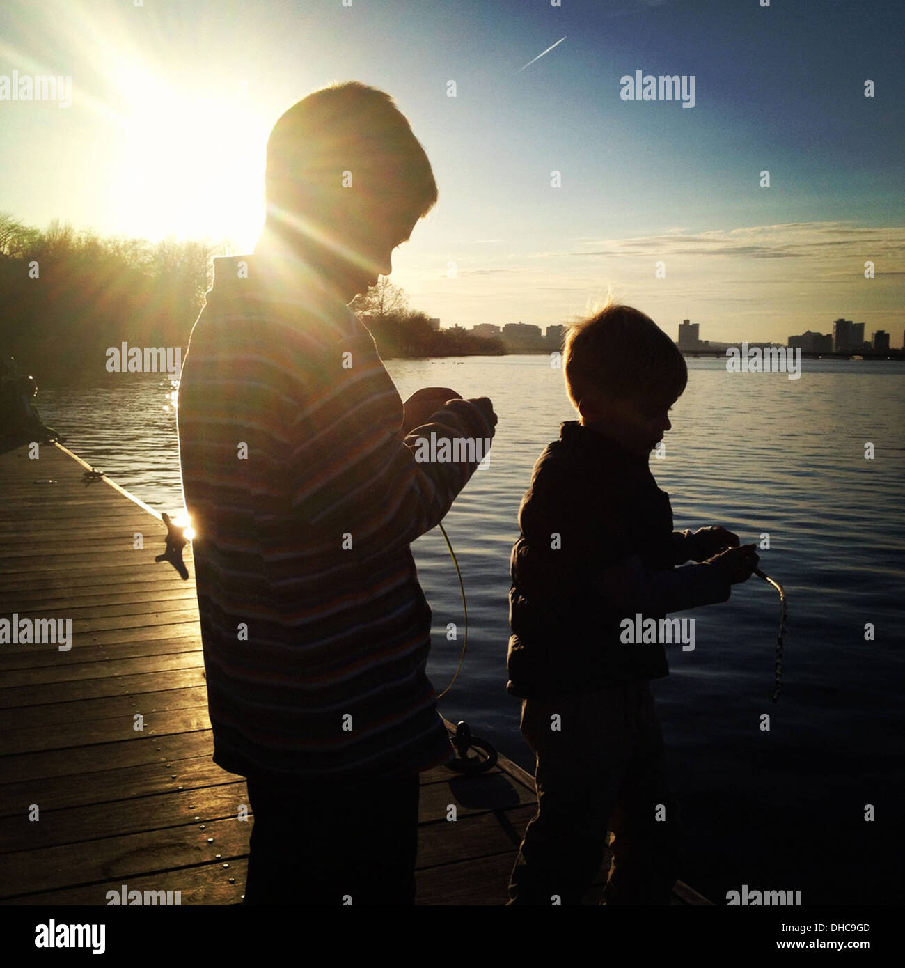Boys fishing dock hi-res stock photography and images - Alamy