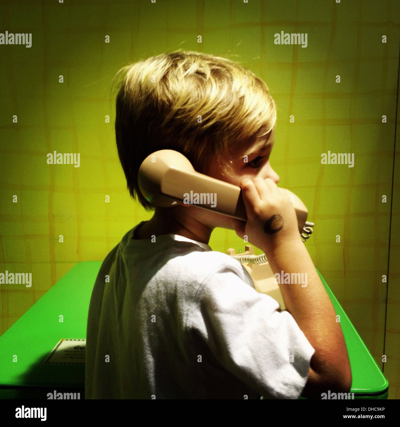 Boy on Old Telephone Stock Photo - Alamy