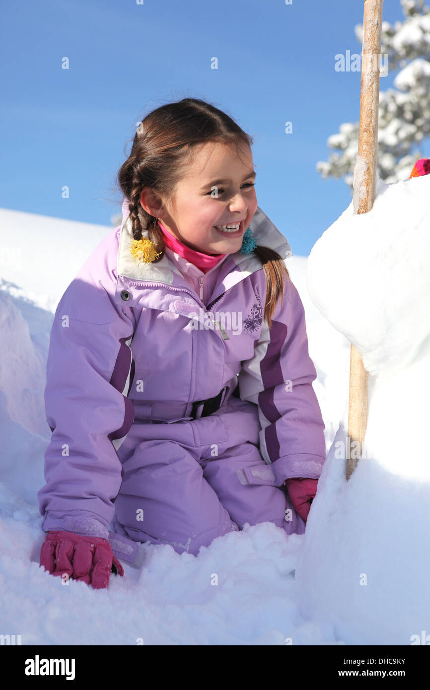 Little girl in the snow Stock Photo - Alamy
