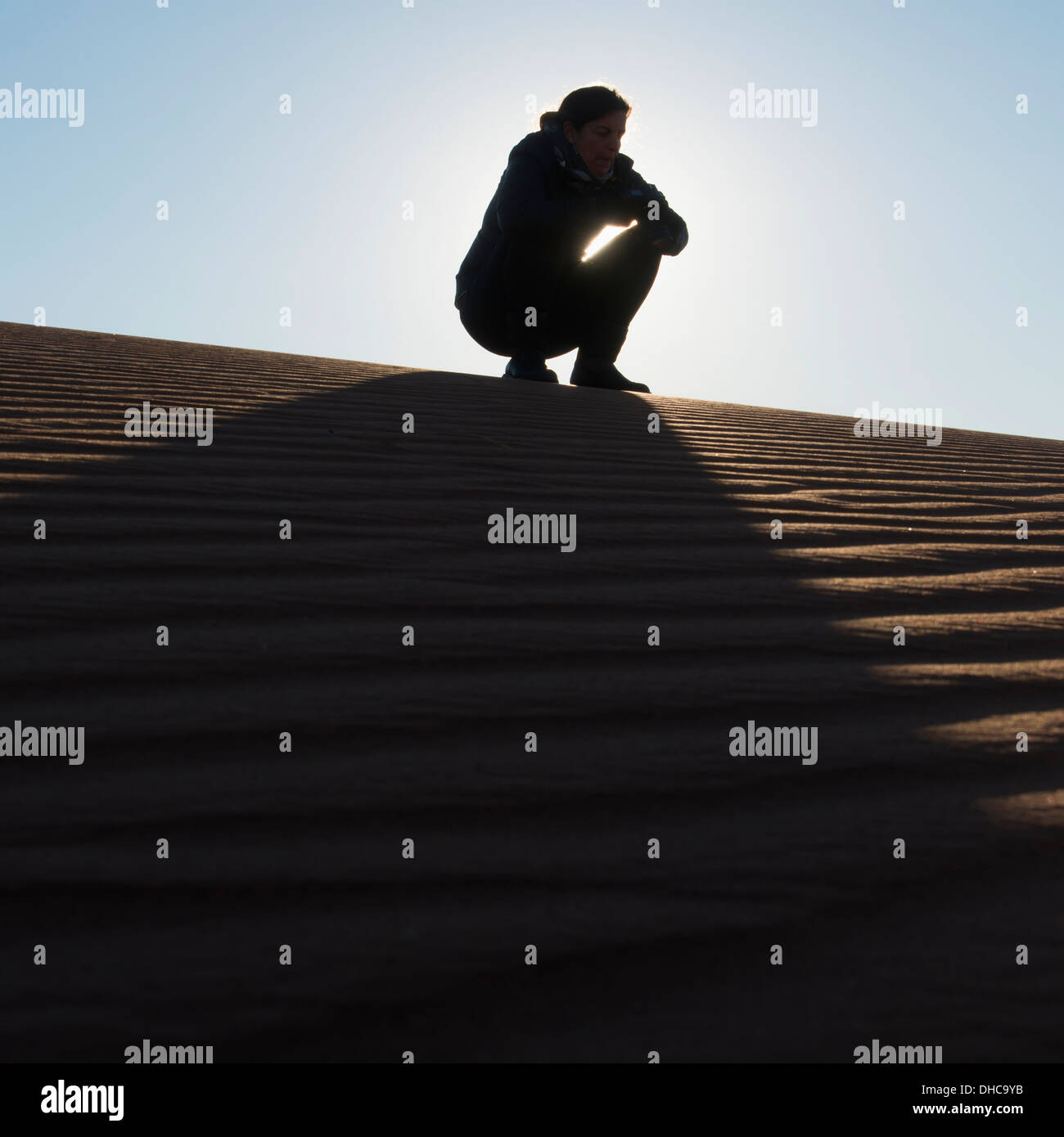 Person crouching isolated hi-res stock photography and images - Alamy