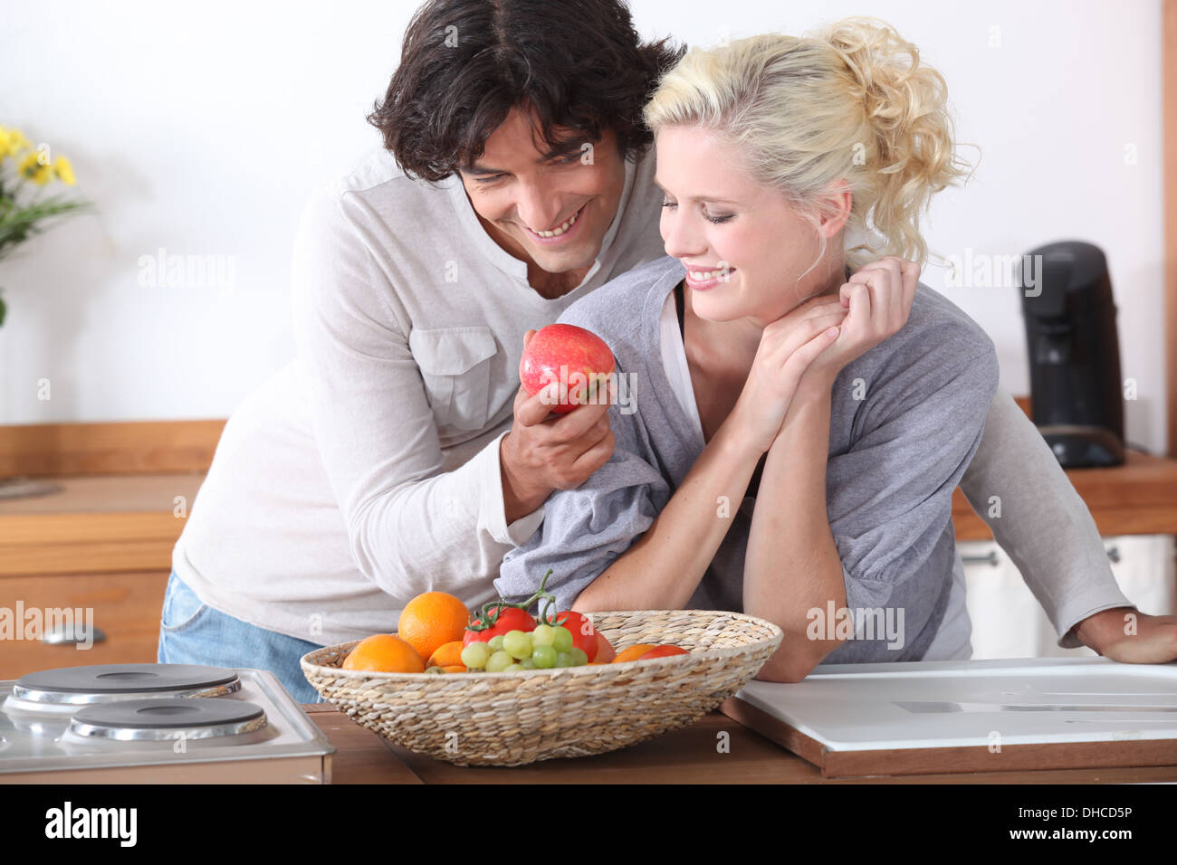 Romantic couple in the kitchen Stock Photo - Alamy