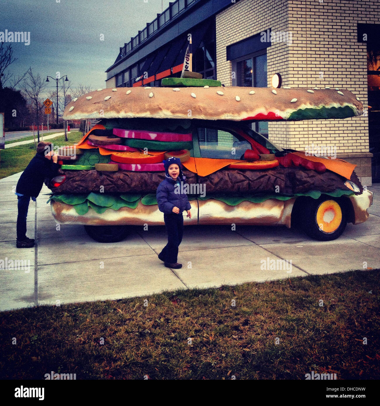 Two Boys with Hamburger Car Stock Photo - Alamy