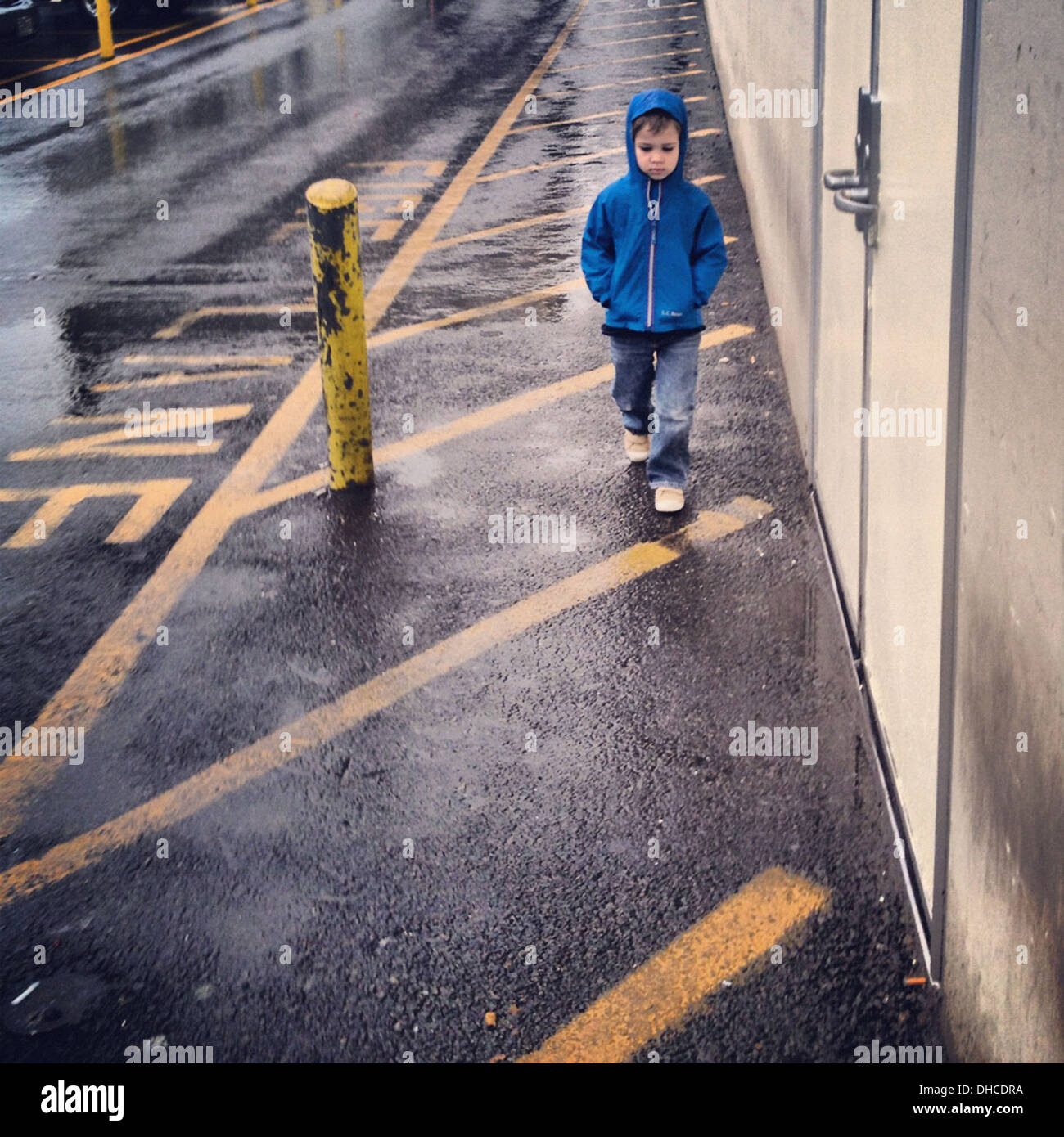 Sad Boy Walking In The Rain