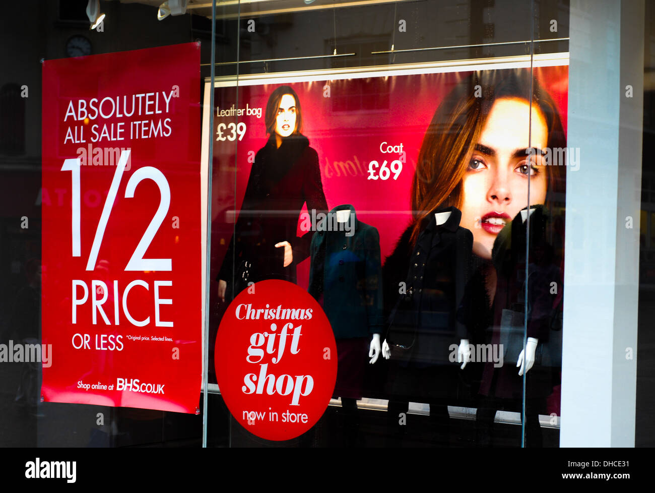 BHS 1/2 price sale signs half price discount Stock Photo - Alamy
