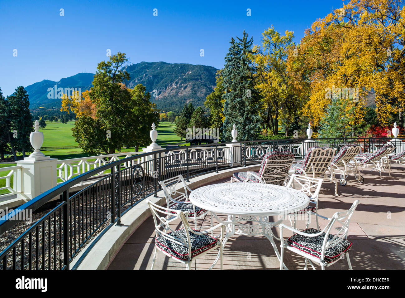Chairs & tables on patio overlooking the golf course, The Broadmoor ...