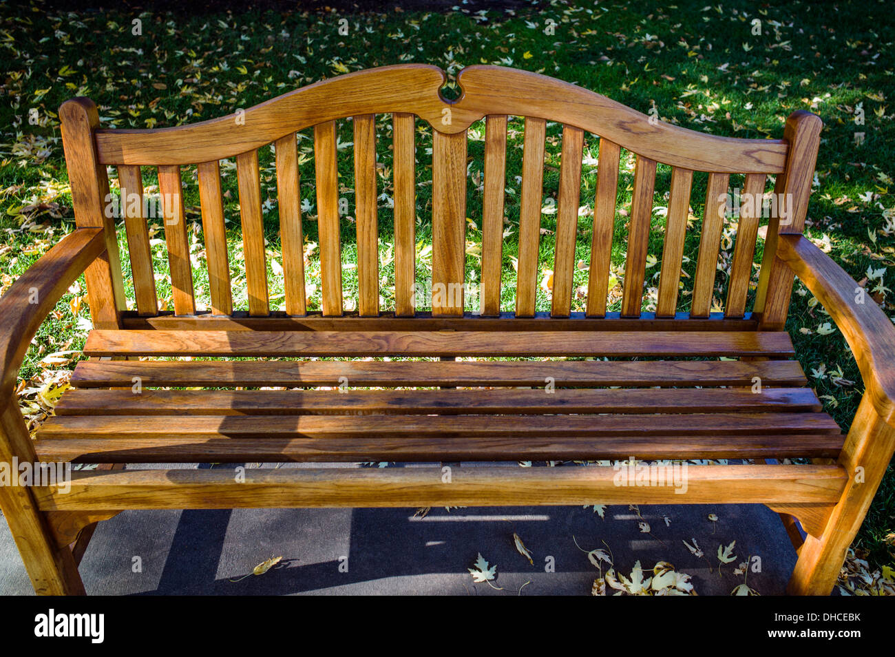 Wooden bench overlooks Cheyenne Lake, The Broodmoor, historic luxury ...
