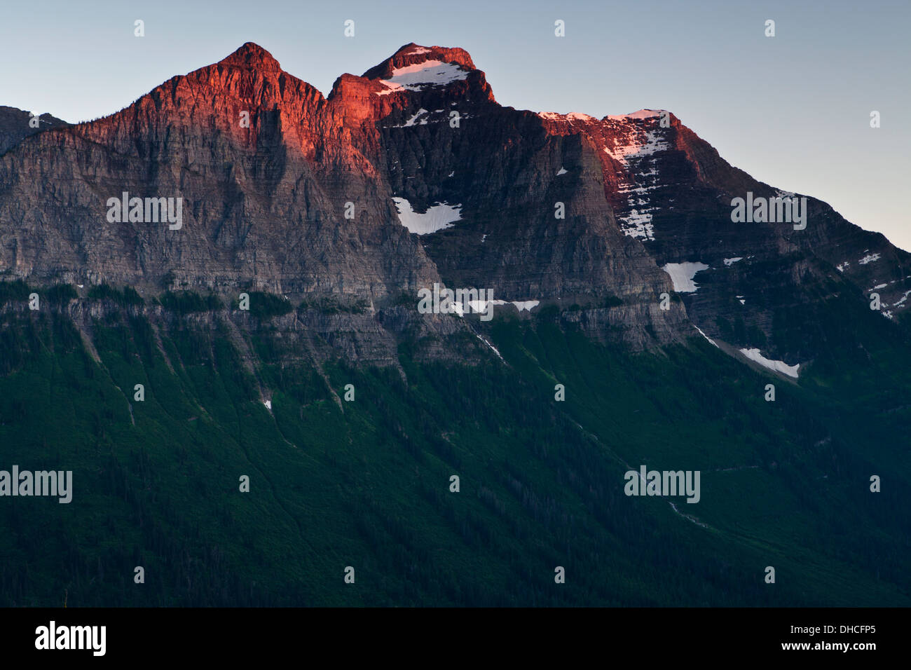 Evening light on Canon Mountain and Mount Oberlin, Glacier National ...