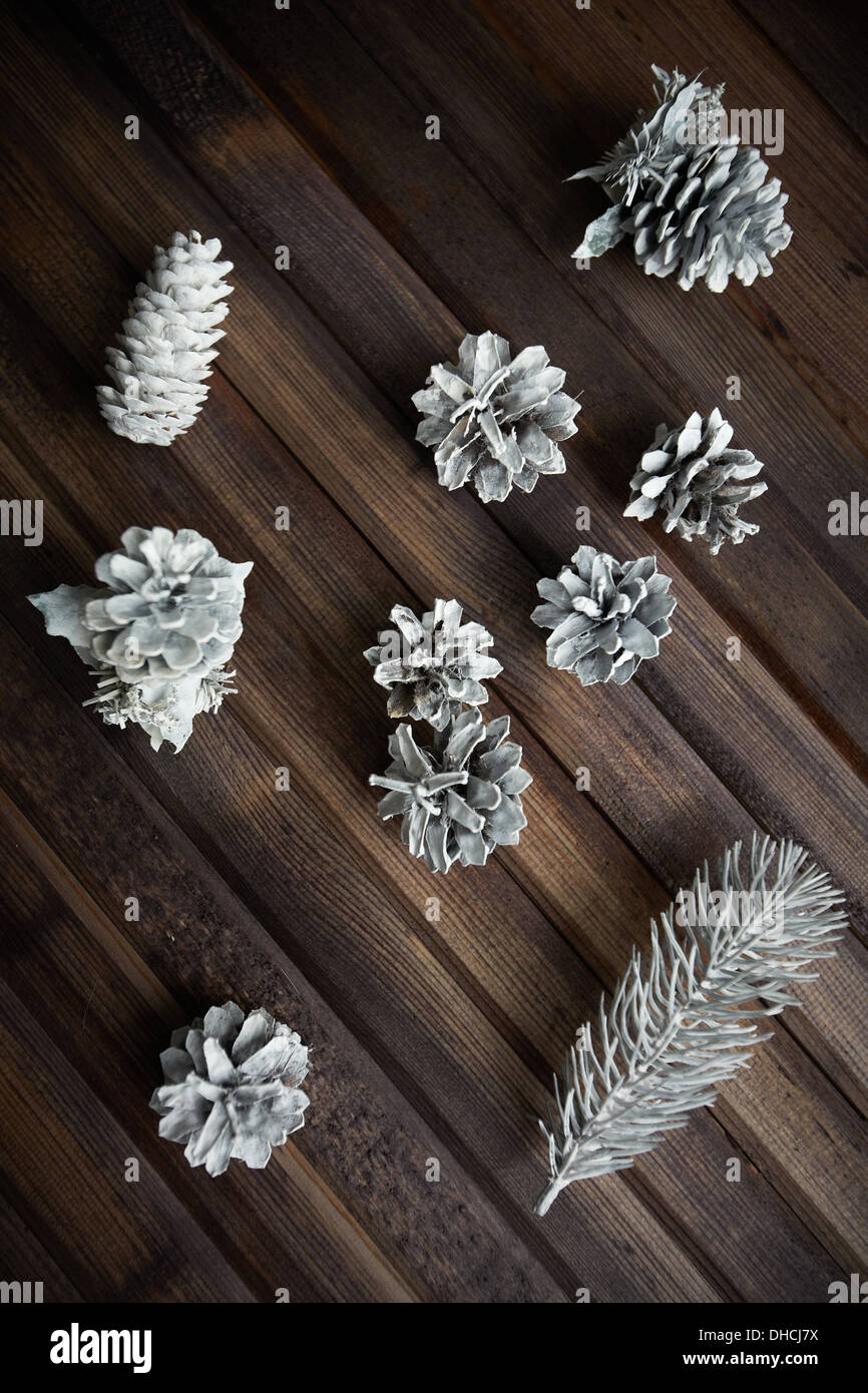 Image of several decorative silver cones on wooden background Stock ...