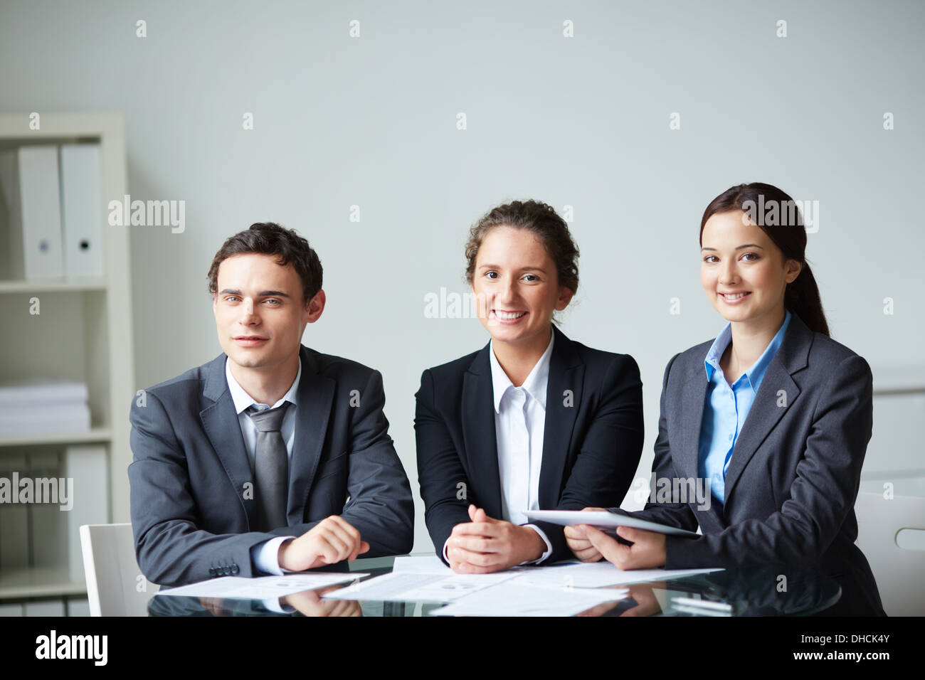 Portrait of smart business partners working together in office Stock ...