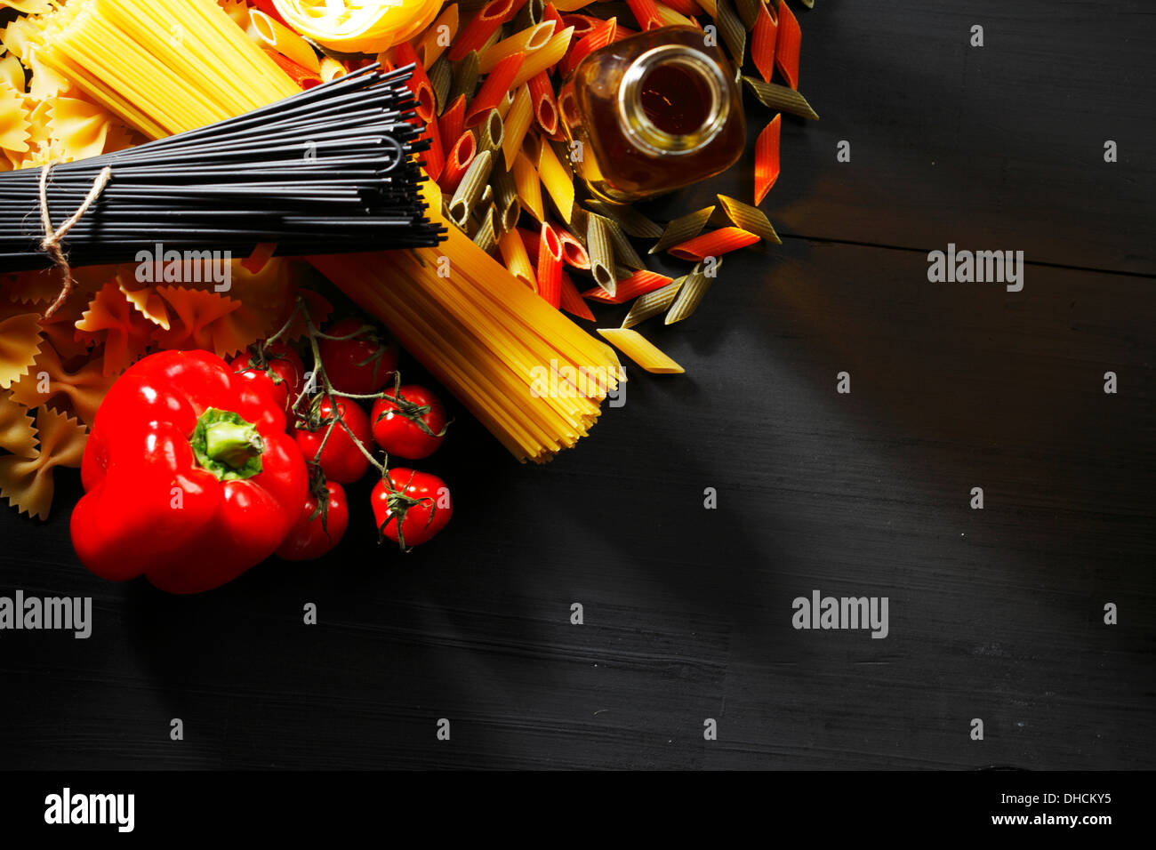 Pasta ingredients on black table, italian cuisine concept Stock Photo ...