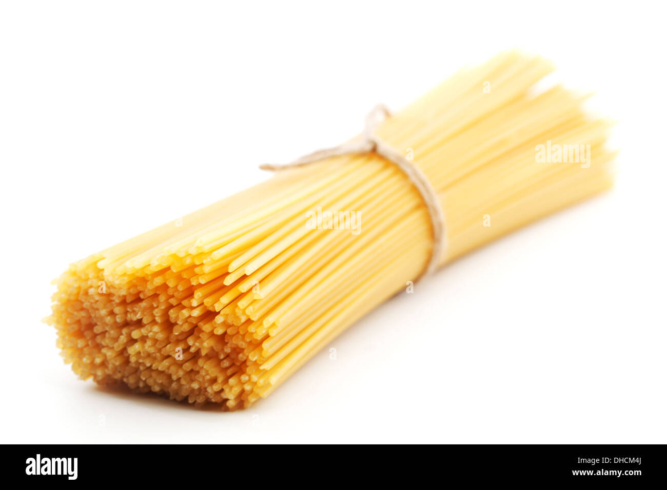 Dry spaghetti isolated on white background Stock Photo - Alamy
