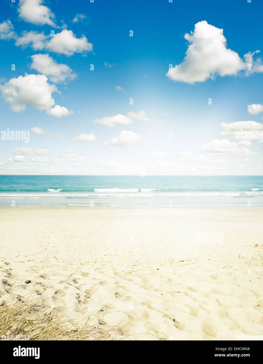 Sand, water and sky beach scenery Stock Photo - Alamy