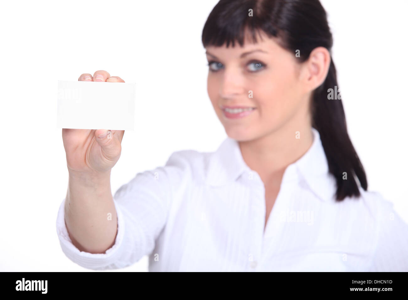 Woman presenting her business card Stock Photo - Alamy