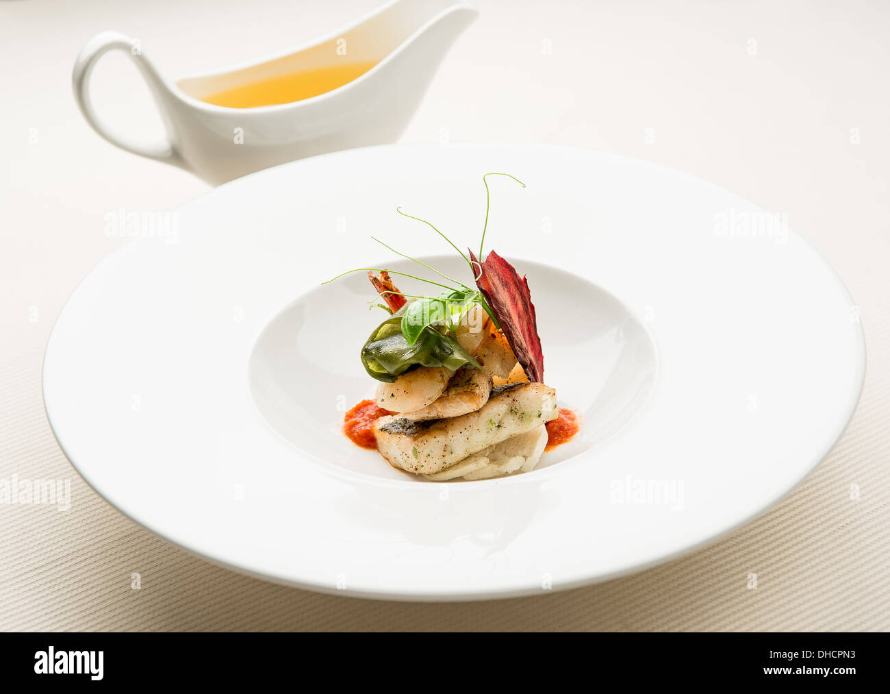 Fish fillet and dish with hot broth Stock Photo - Alamy