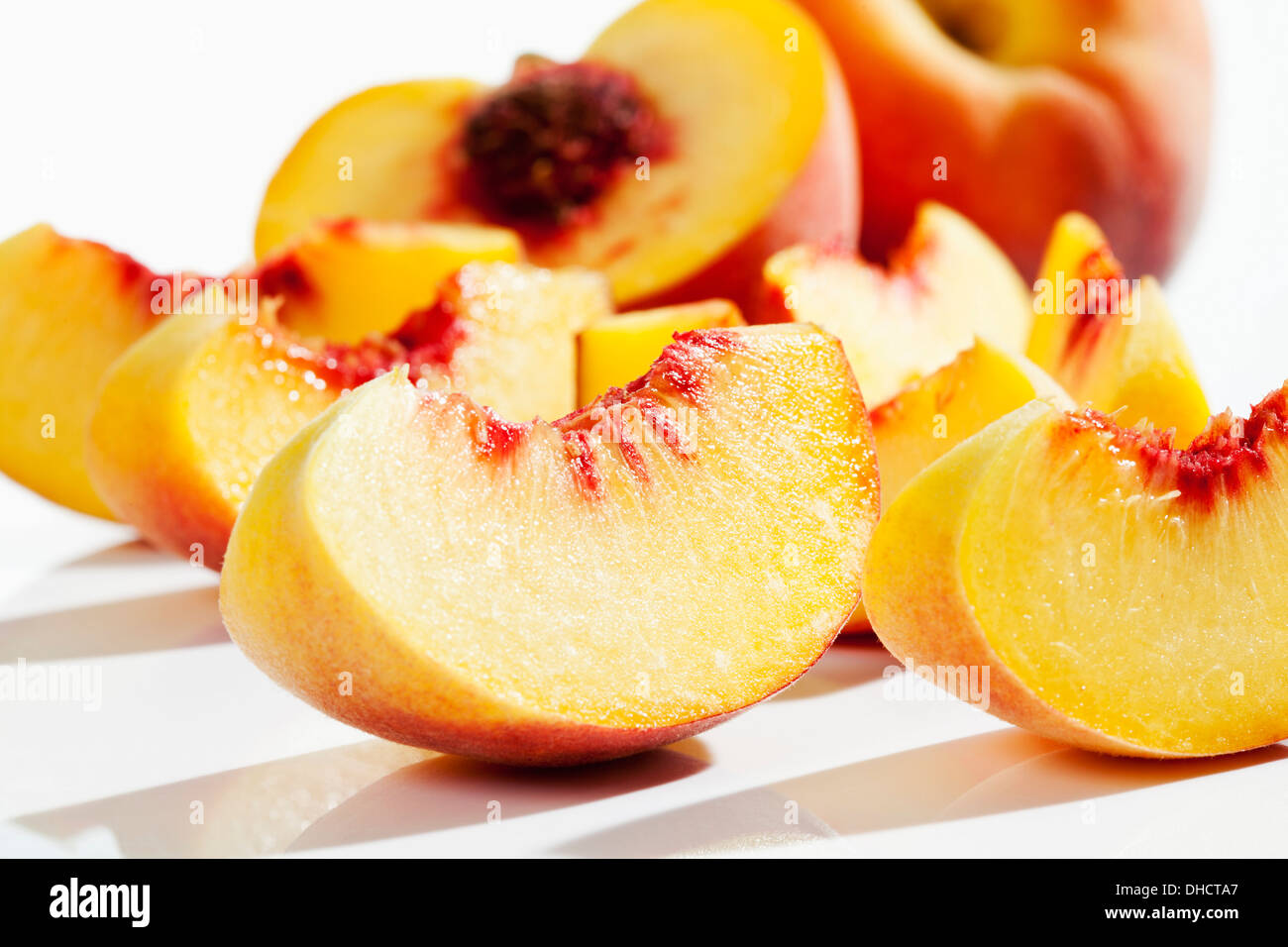 Peach slices white background hi-res stock photography and images - Alamy