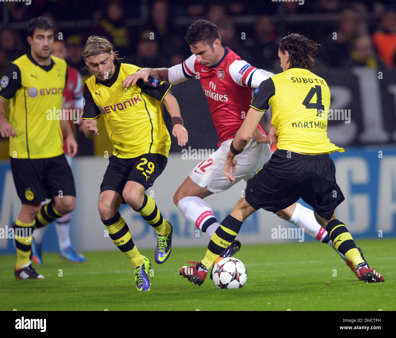 Dortmund, Germany. 06th Nov, 2013. Dortmund's Marcel Schmelzer (L) and ...